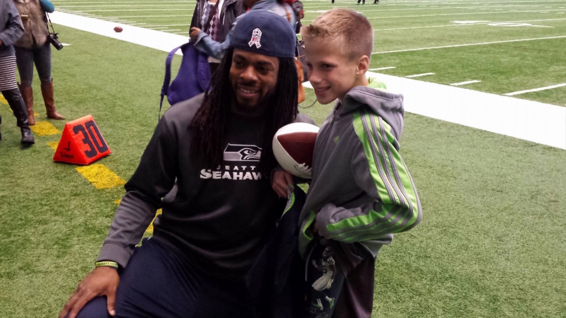 Local boy overcomes tumor, meets Seattle Seahawk | ktvb.com