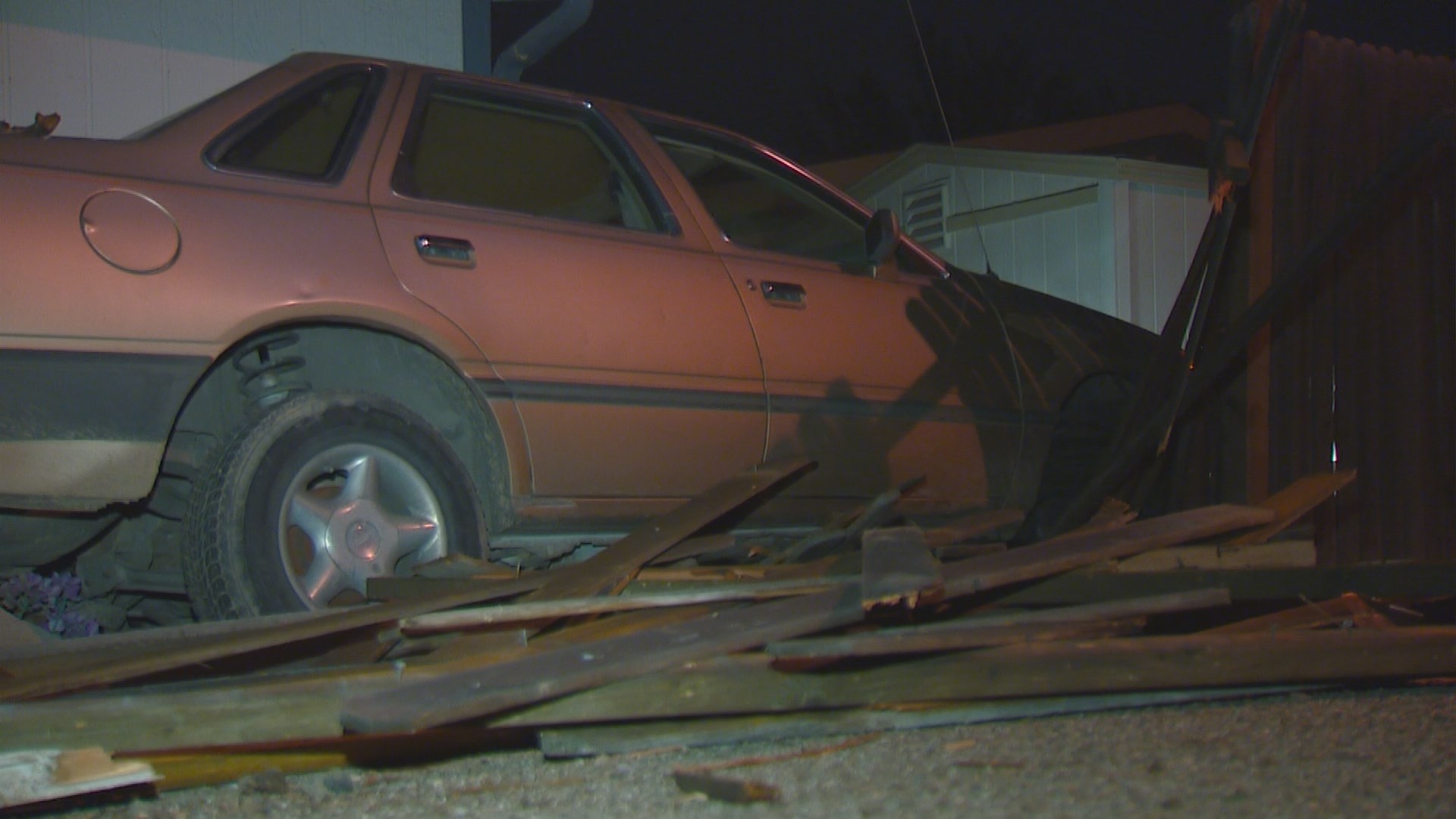 Car smashes through fence at Boise home | ktvb.com